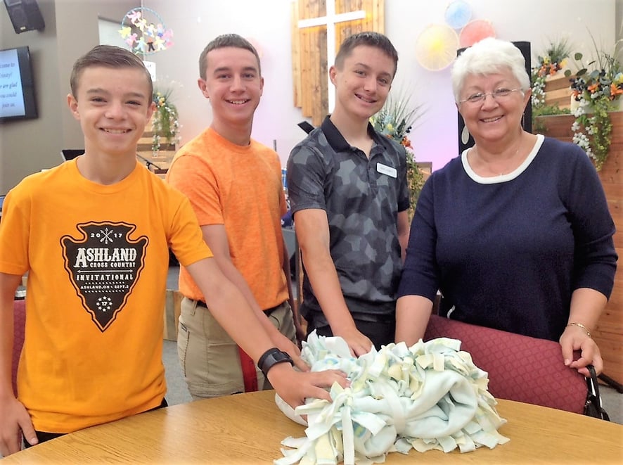 How can the church engage families in service projects?